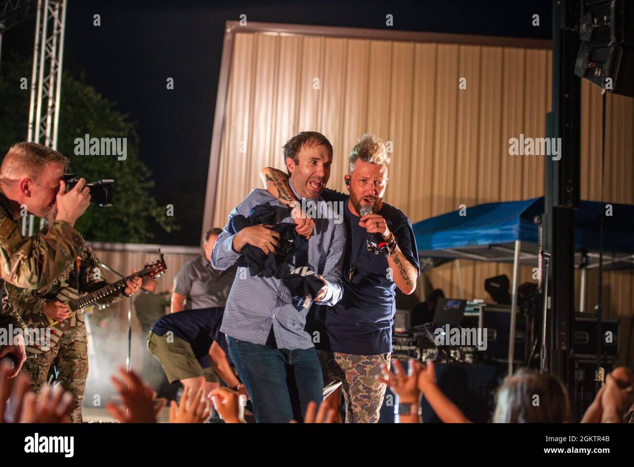 Chris Lucas (right), vocalist with the band LoCash, and Taylor ...