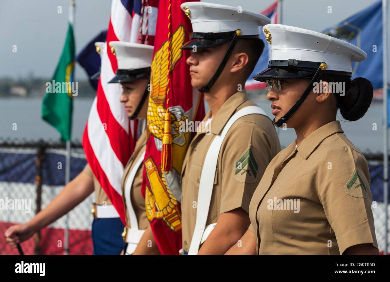 A U.S. Marine color guard waits with the colors during an all-military ...