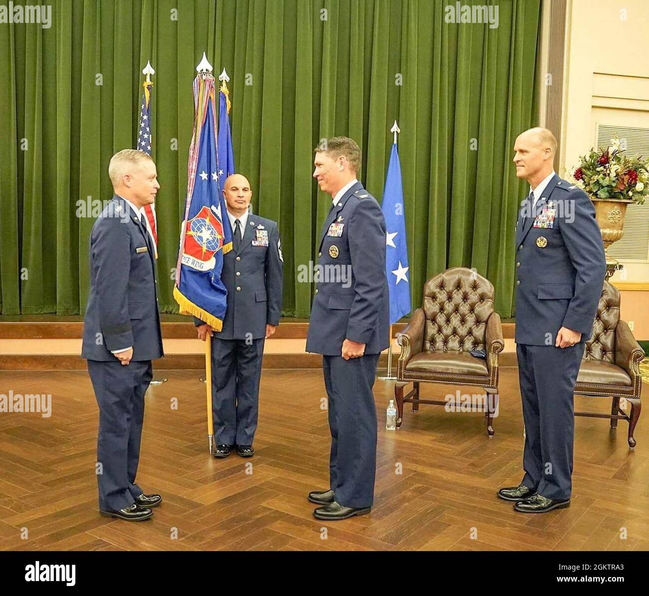 The 688th Cyberspace Wing holds a change of command ceremony July 1 ...