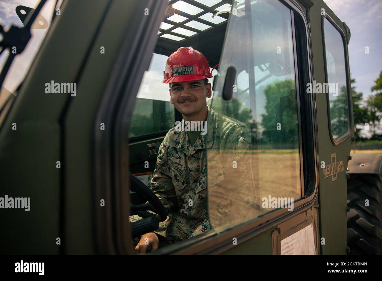 U.S. Marine Corps Lance Cpl. Frank Card, a native of Tampa, Fla. and a ...