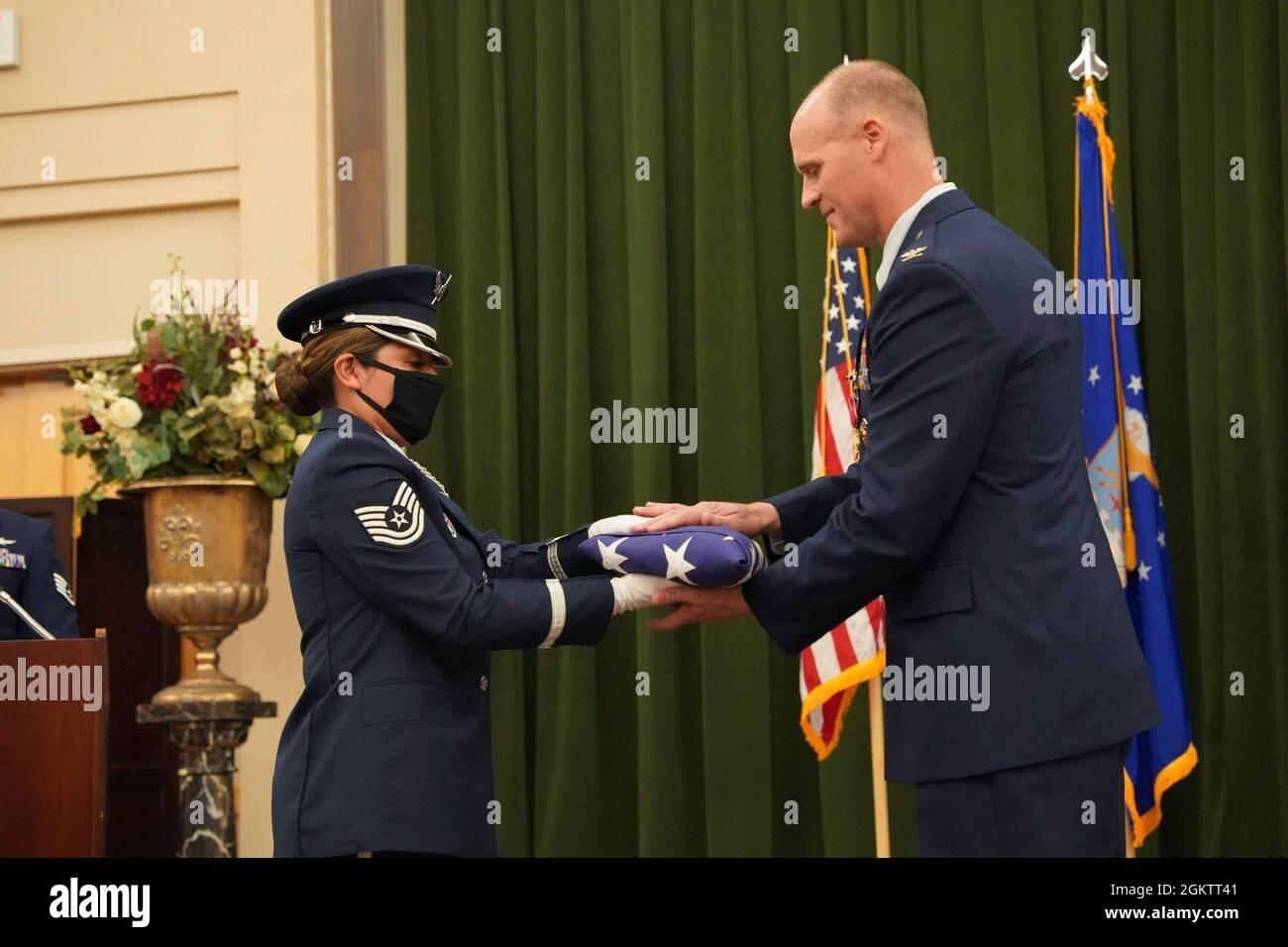 Col. Steven Anderson, former 688th Cyberspace Wing commander receives a ...