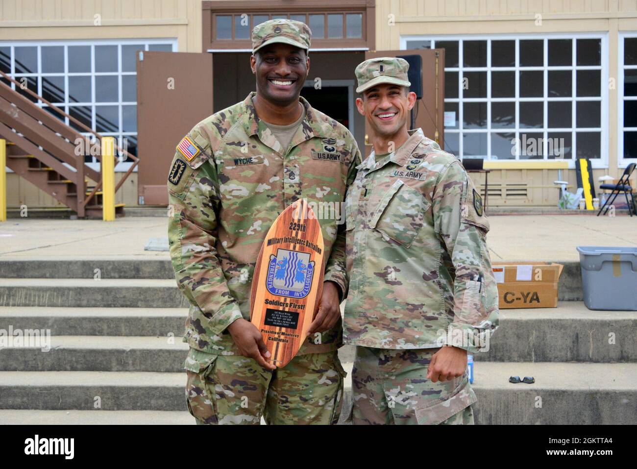 First Lt. Saman Kiani, right, says farewell to Staff Sgt. Willie Wyche ...
