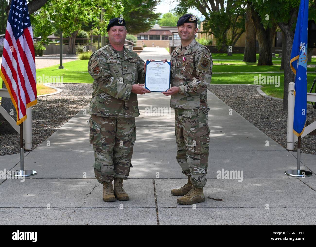 U.S. Air Force Maj. Daniel Beaudoin (right), outgoing 377th Security ...