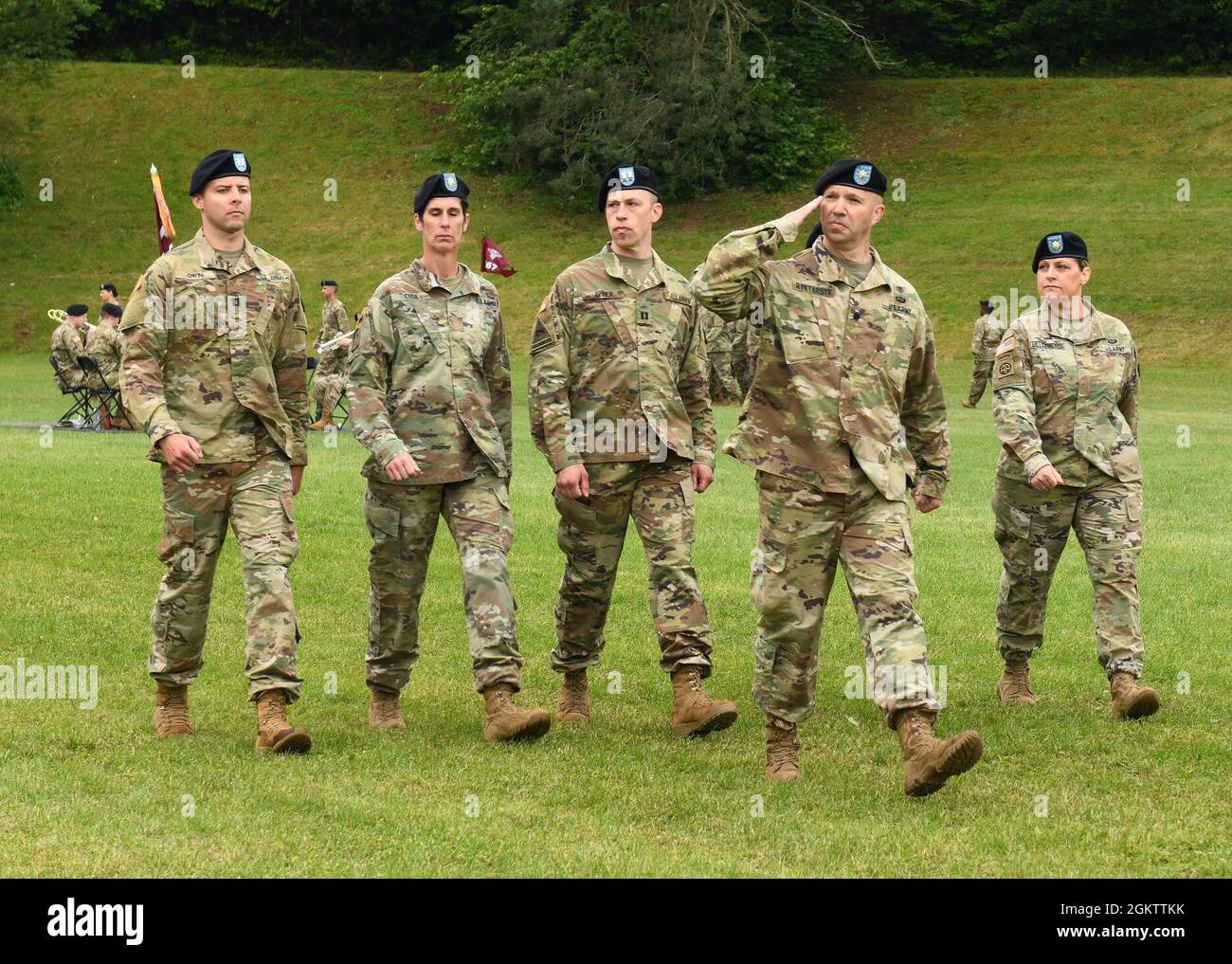U.S. Army Lt. Col. Todd A. Ryktarsyk, commander of troops, renders a ...