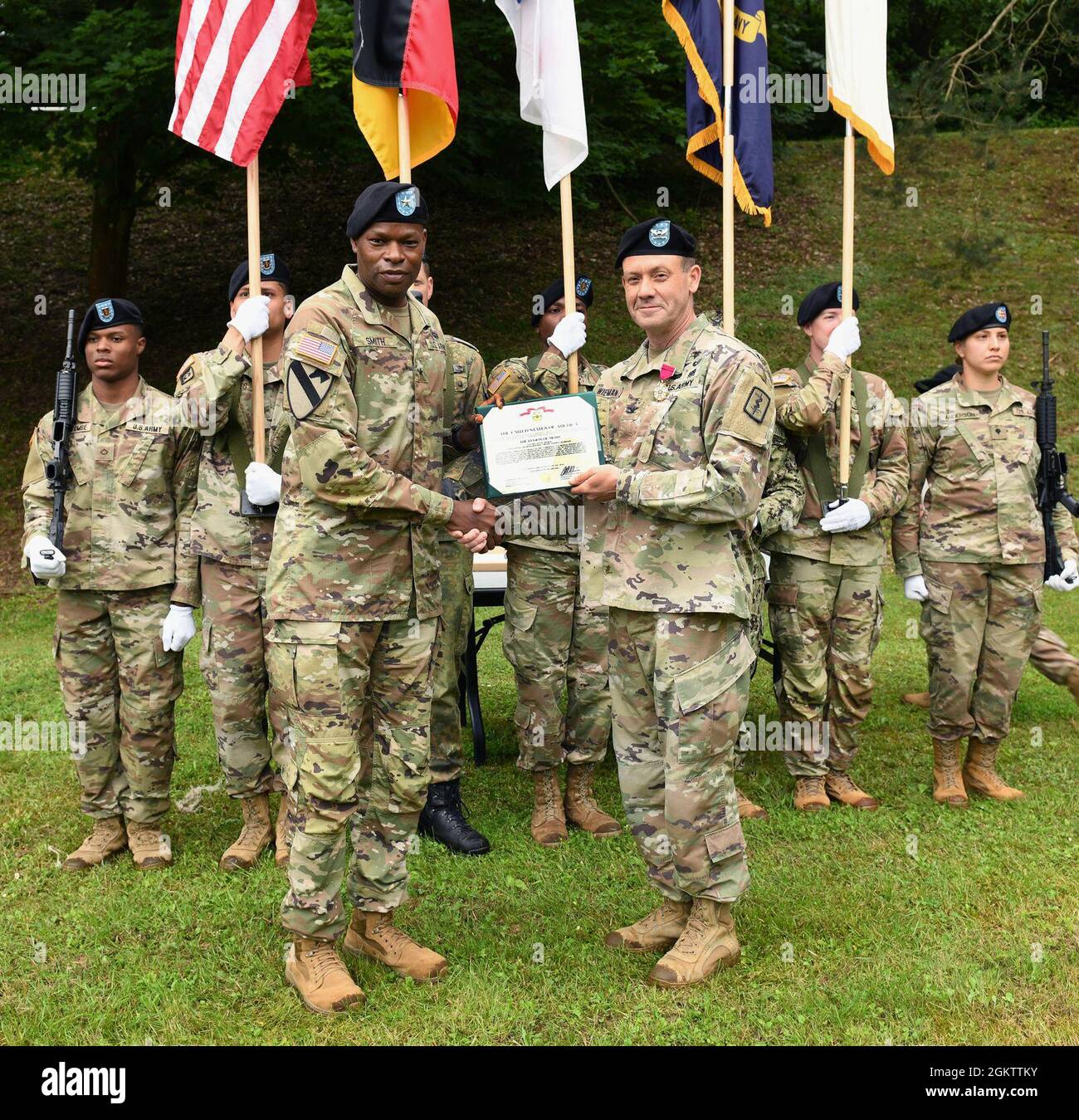U.S. Army Brig. Gen. James M. Smith (left) commander, 21st Theater Sustainment Command and Col ...