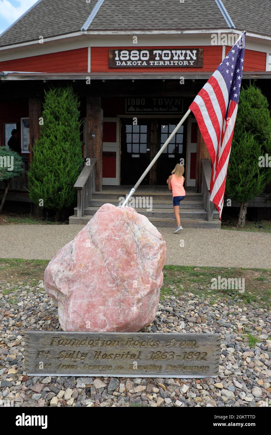 The entrance of South Dakota's original 1880 Town with a US flag in ...