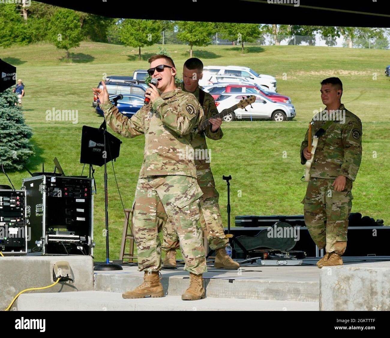 Sgt. Mark Meier, musician with the 34th Army Band, Sidewinders, sings ...