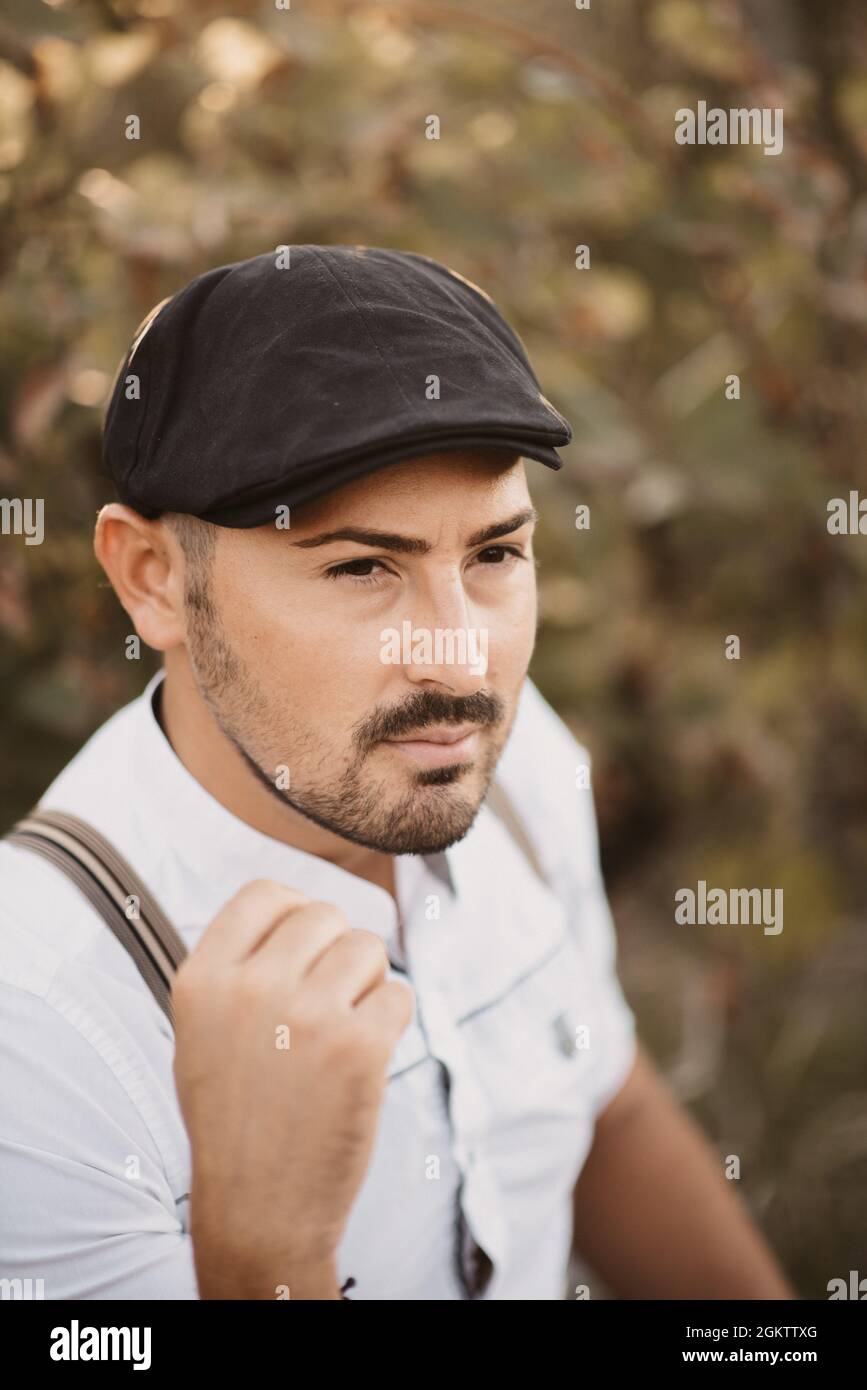 Man sitting in the field Stock Photo - Alamy
