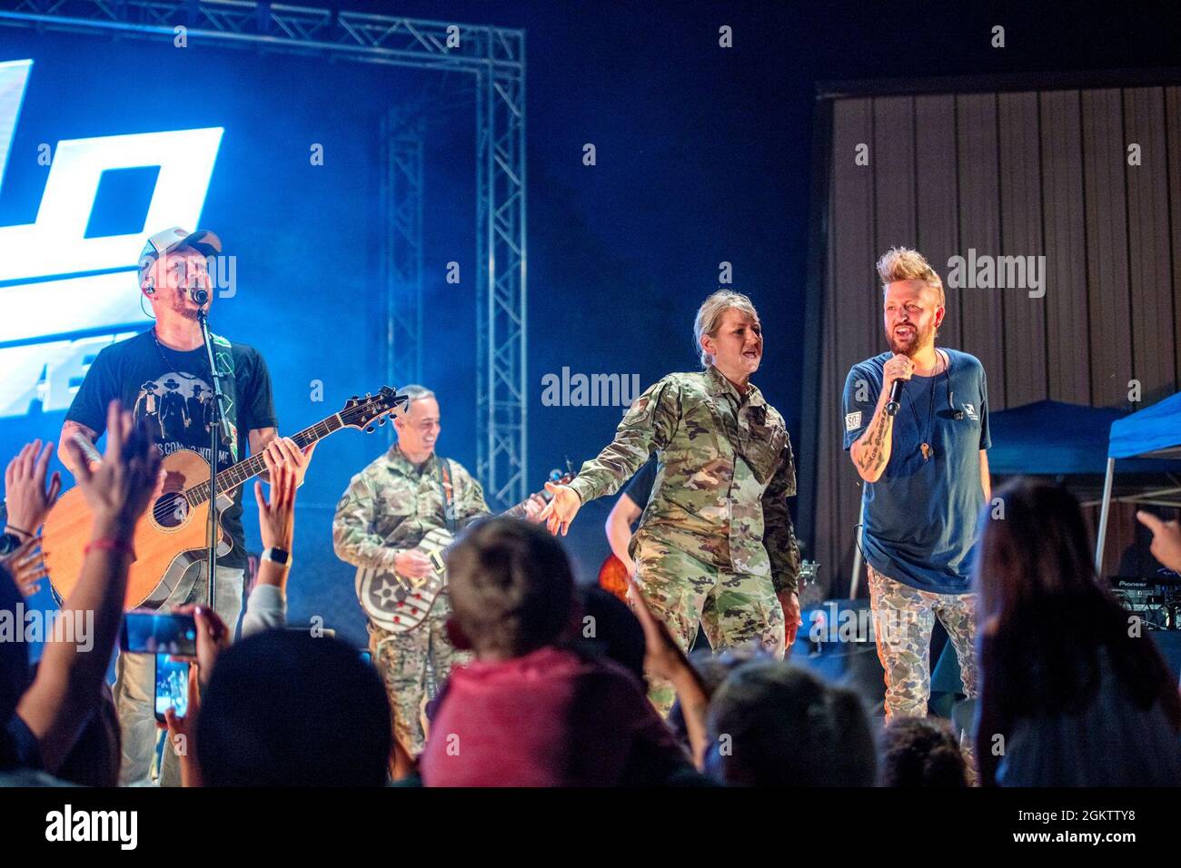 SEAC Ramón "CZ" Colón-López (backstage center), the Senior Enlisted ...