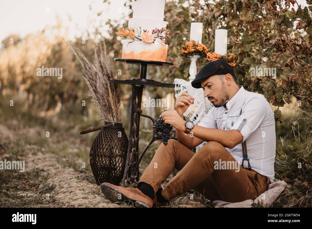 Man sitting in the field Stock Photo - Alamy