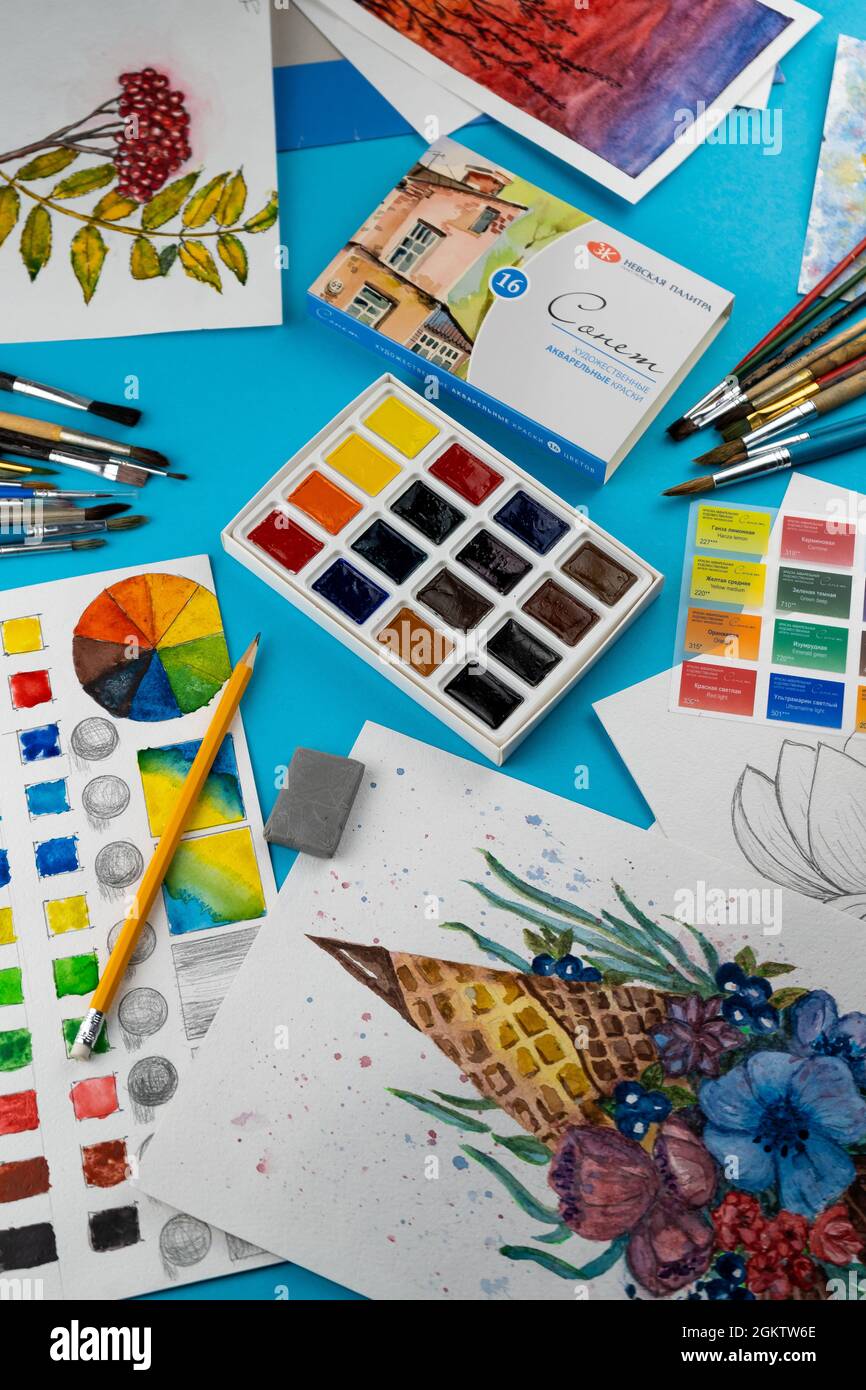A box of watercolors with brushes. Draw, background. Packing of ...