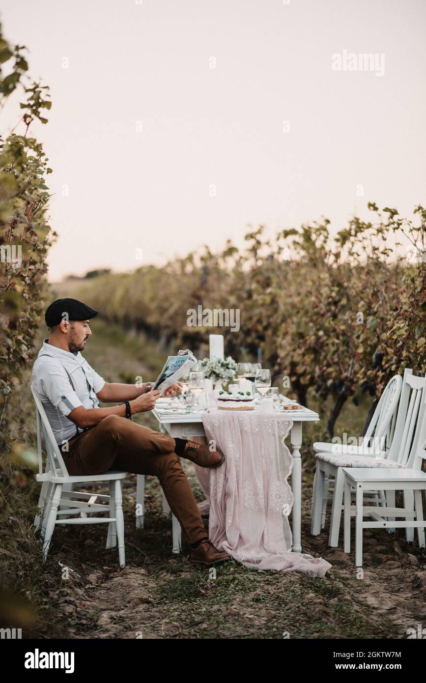 Man sitting in the field Stock Photo - Alamy