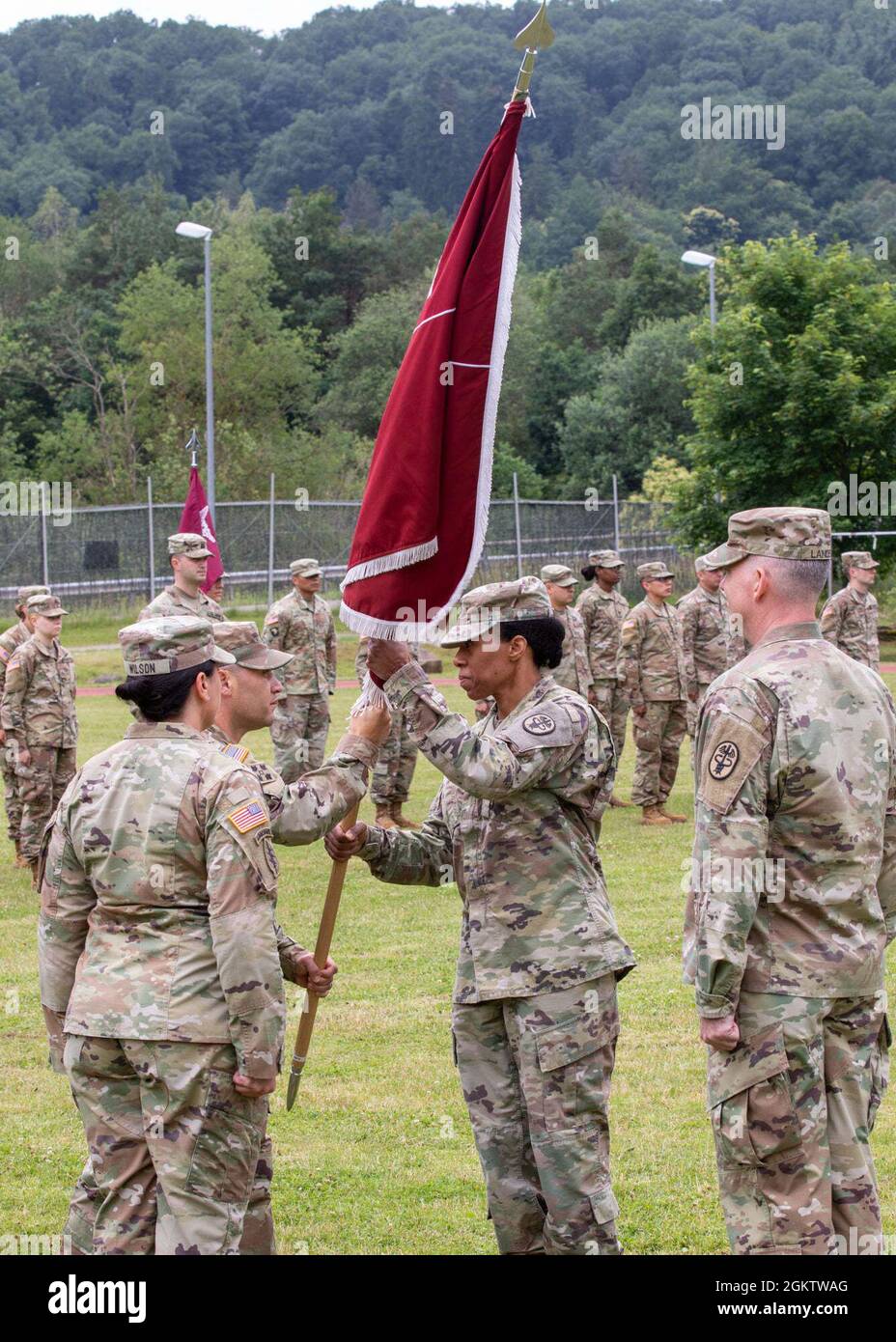 U.S. Army Lt. Col. Christina Buchner receives the unit colors from U.S ...