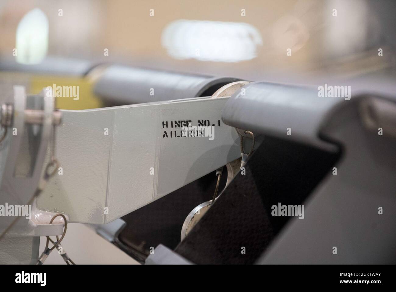 The hinge end of an aileron awaits repair during an aileron repair ...