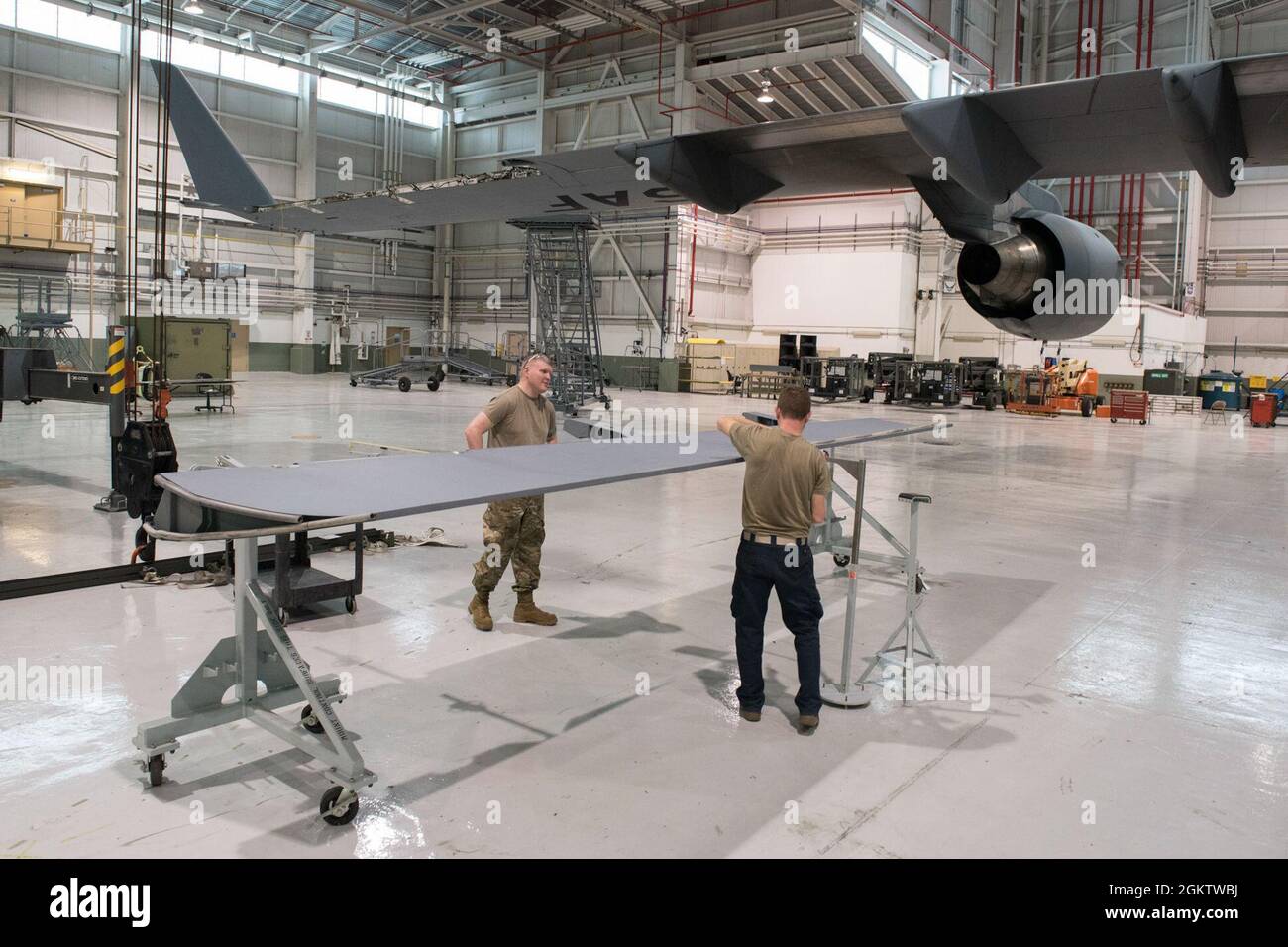 U.S. Air Force Tech. Sgt. Daniel Barrow and Tech. Sgt. Anthony Scolaro ...