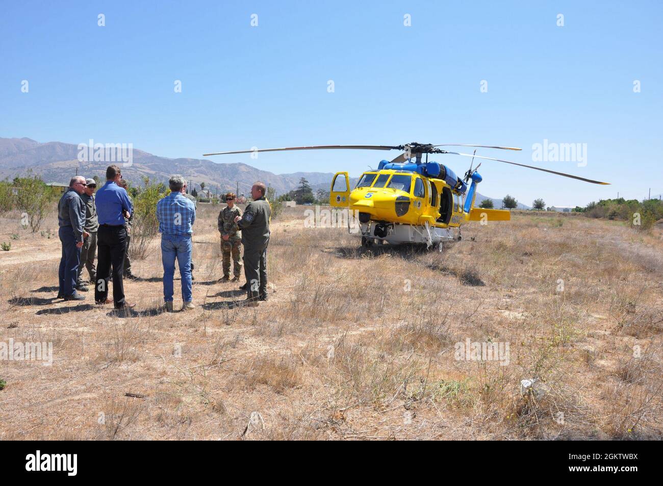 A Ventura County Fire Department helicopter crew provides a pre-flight ...