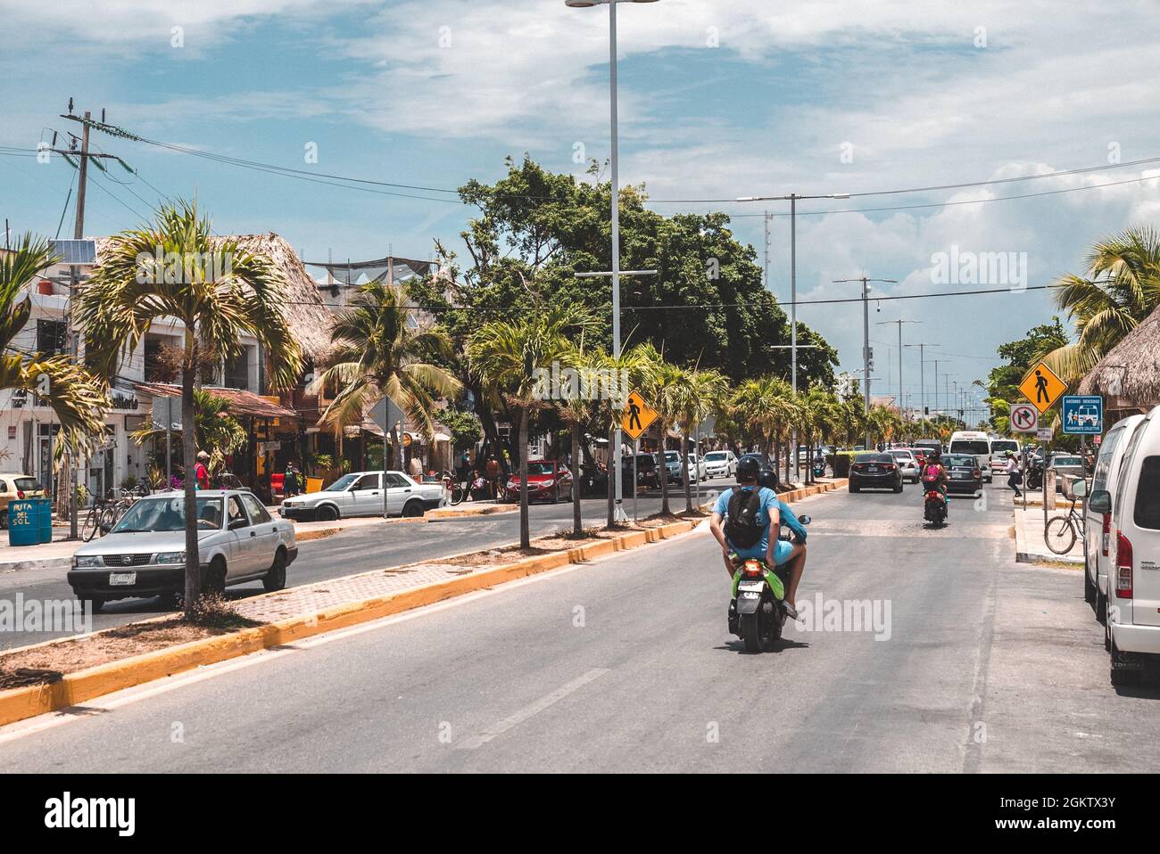 Urban city traffic scene on two way road with crossing signboard Stock ...