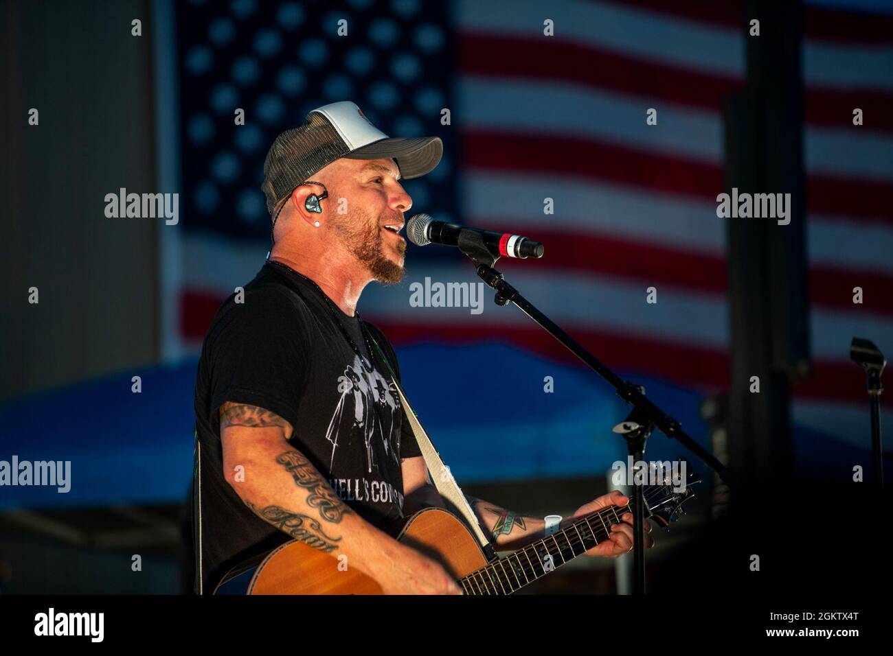 Chris Lucas, vocalist with the band LoCash, performs during the USO ...