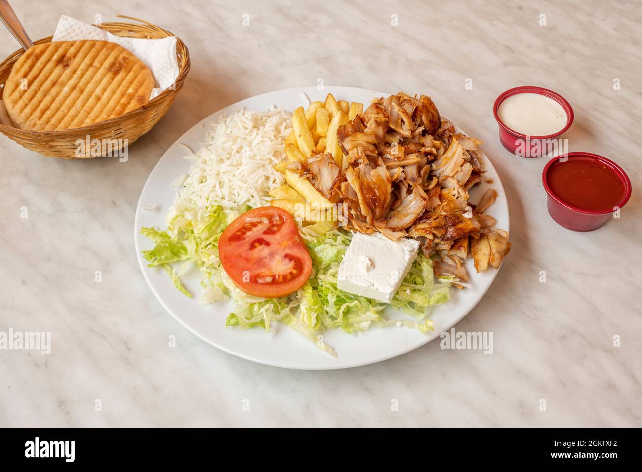 Menu plate chicken kebab with fresh cheese, with cold potatoes, white ...