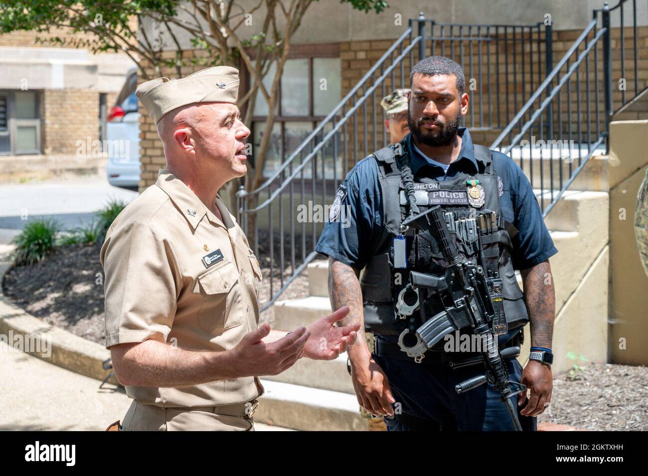 WASHINGTON, DC (July 1, 2021) – Capt. Mark Burns (left), Naval Support ...