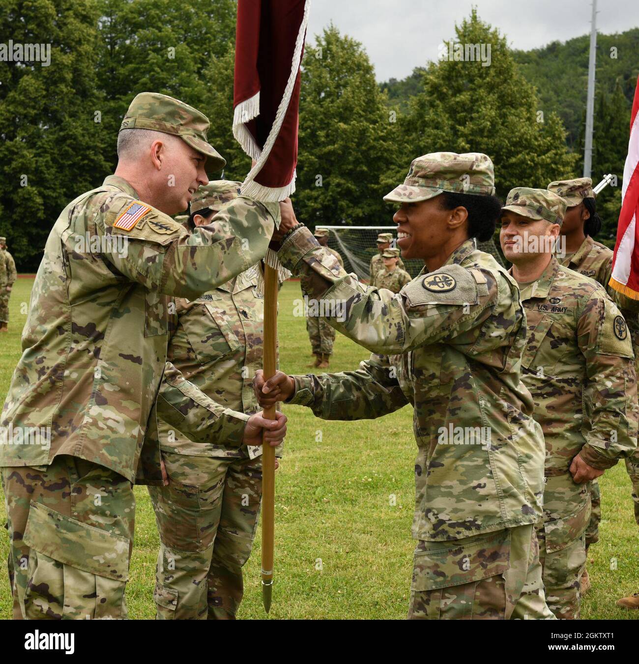 U.S. Army Lt. Col. Christina M. Buchner (right) outgoing commander of ...
