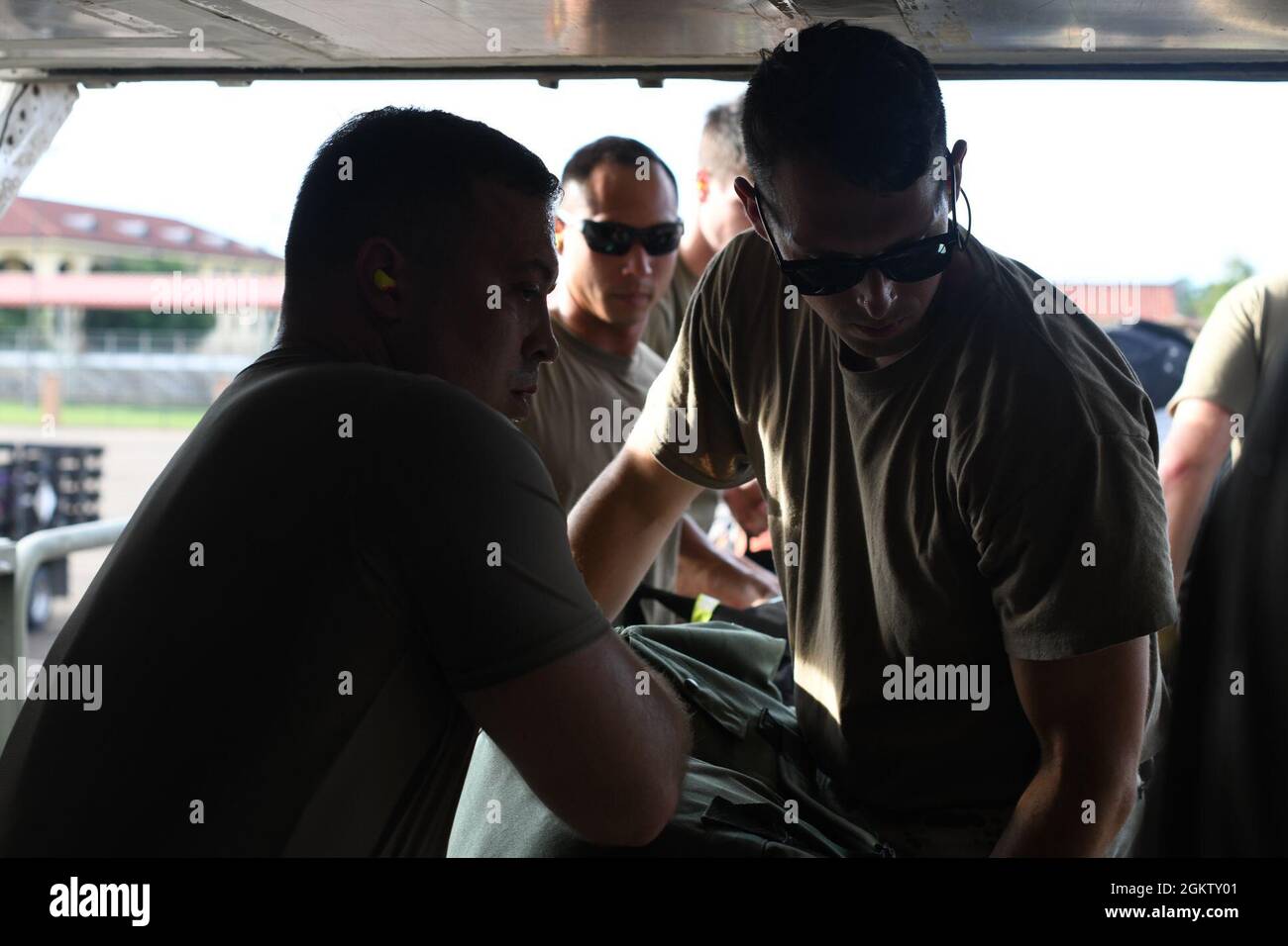 Deploying Airman load cargo onto a plane at Maxwell Air Force Base ...