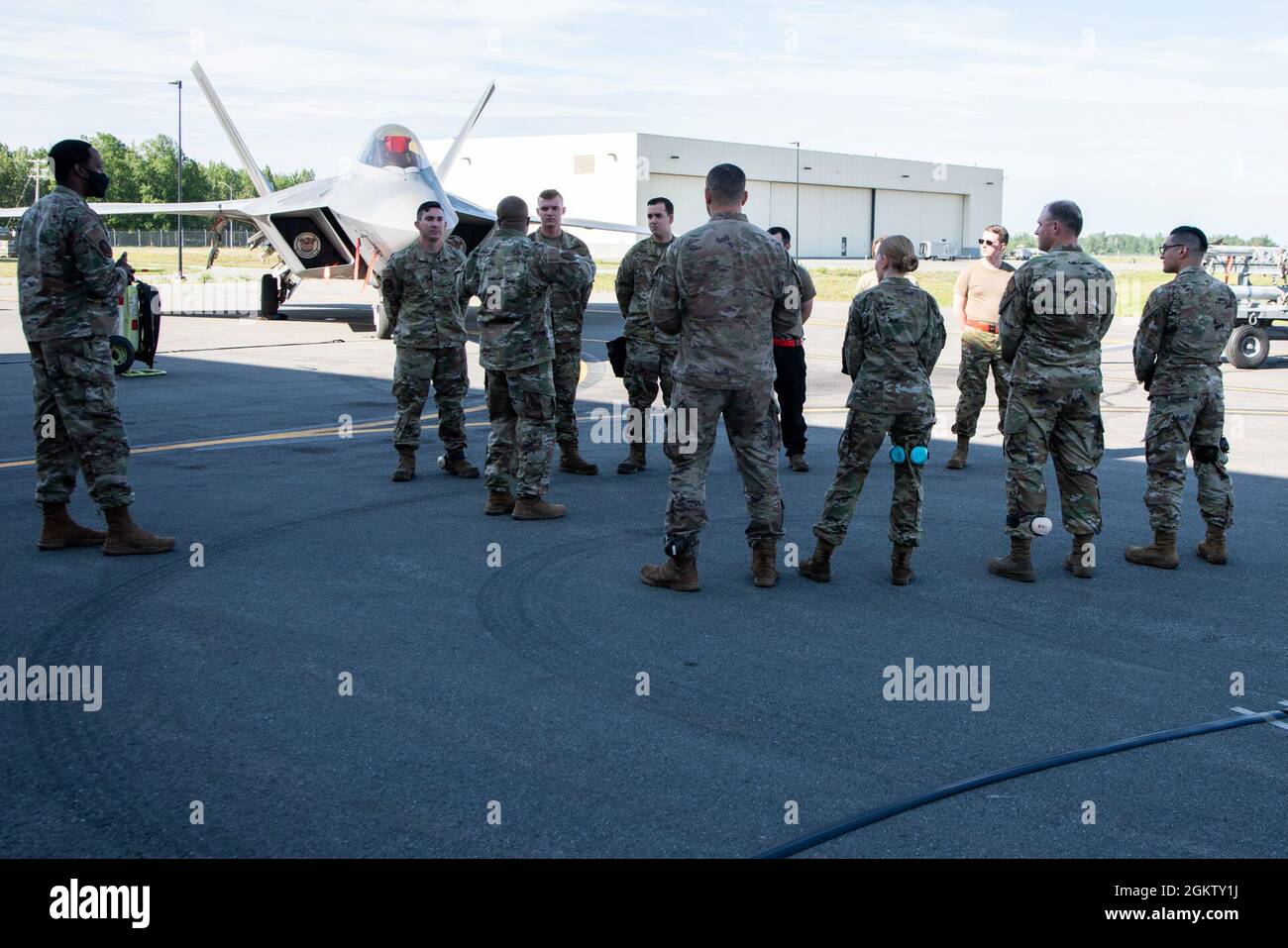 Weapons load crews from the 525th and 90th Aircraft Maintenance Units ...