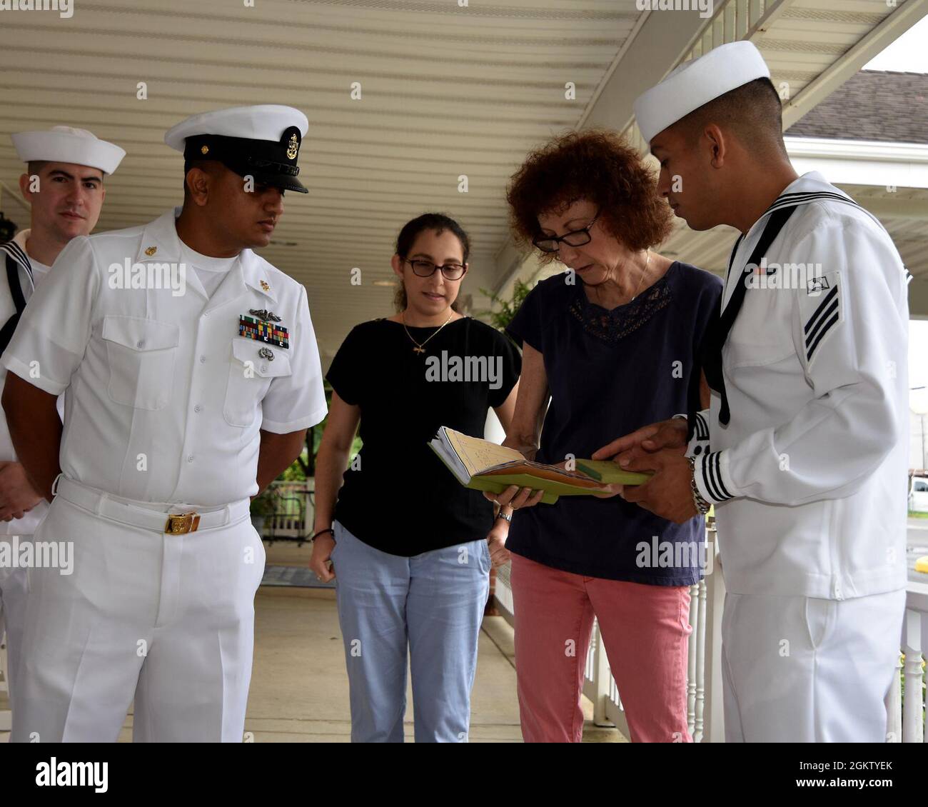 PCU Massachusetts (SN 798) Sailors watch as Geraldine and April Muntz ...