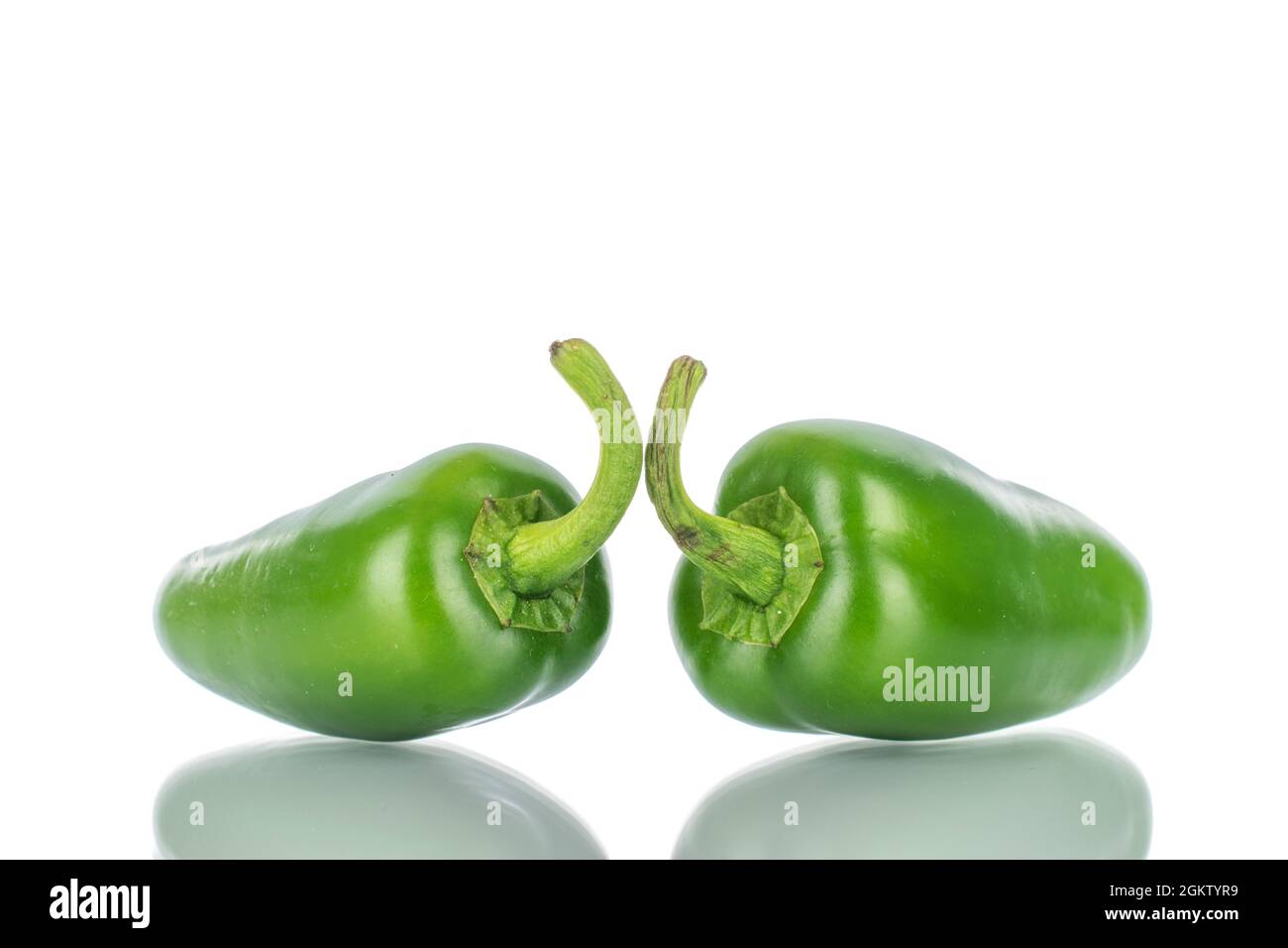 Two green spicy pepper pods, close-up, isolated on white Stock Photo ...