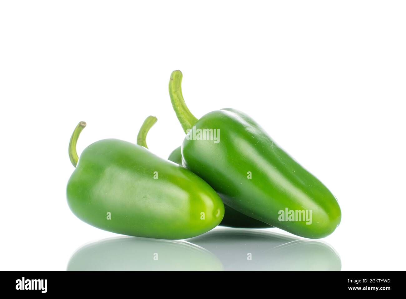 Three green spicy pepper pods, close-up, isolated on white Stock Photo ...