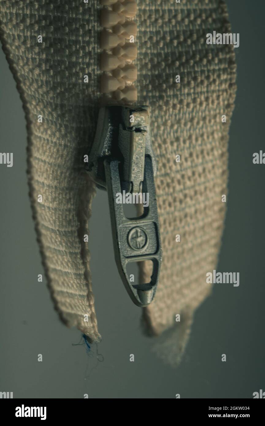 Vertical shot of a zipper for a cloth Stock Photo - Alamy