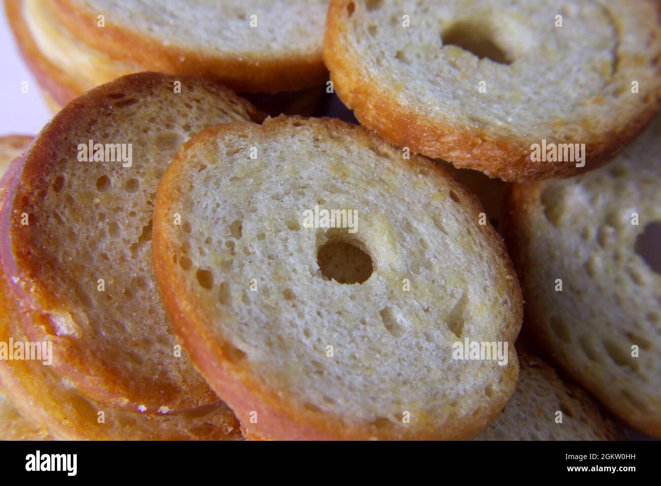 Bake rolls. Round baked bread slices. Mini bread chips close up Stock ...