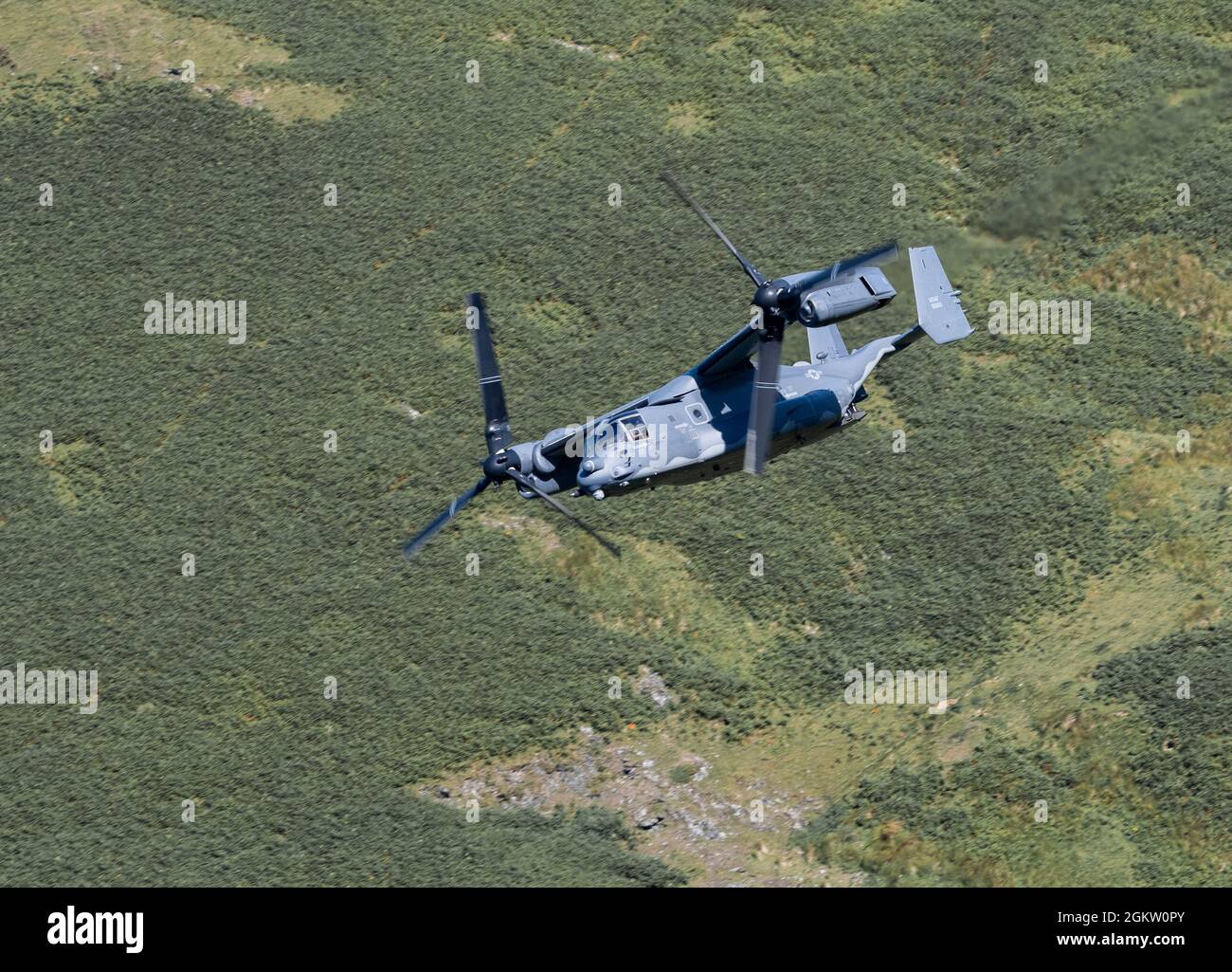 Boeing CV-22B Osprey Low flying over welsh hills Stock Photo - Alamy