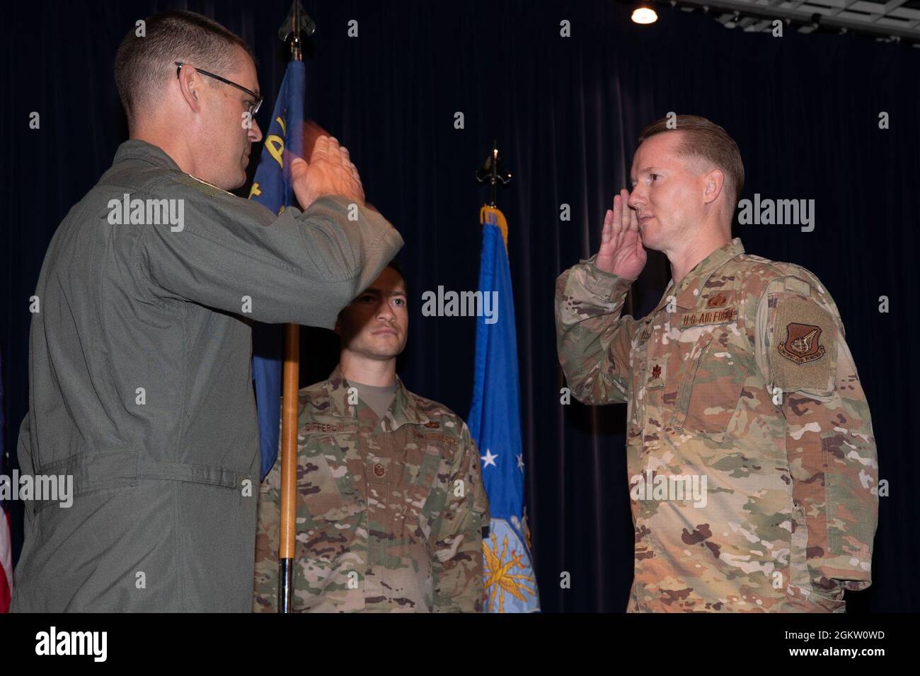 (Right to left) Maj. Ryan Abel, incoming 374th Comptroller Squadron ...