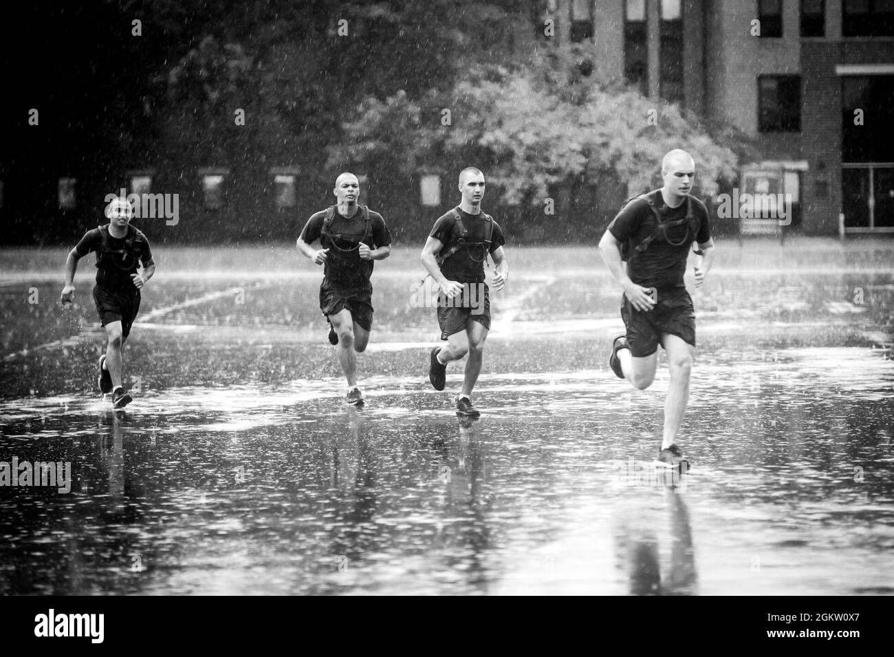 U.S. Marine Corps officer candidates with Alpha Company run through the ...