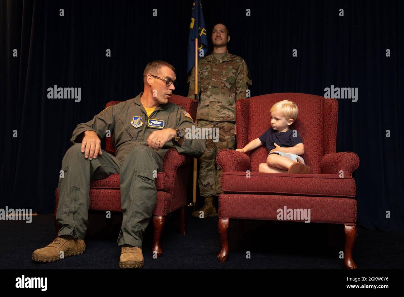 Col. Andrew Campbell, 374th Airlift Wing commander, talks to Greyson ...