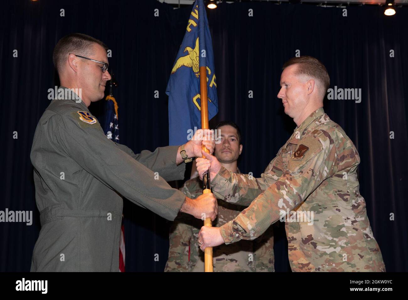 (Left to right) Col. Andrew Campbell, 374th Airlift Wing commander ...