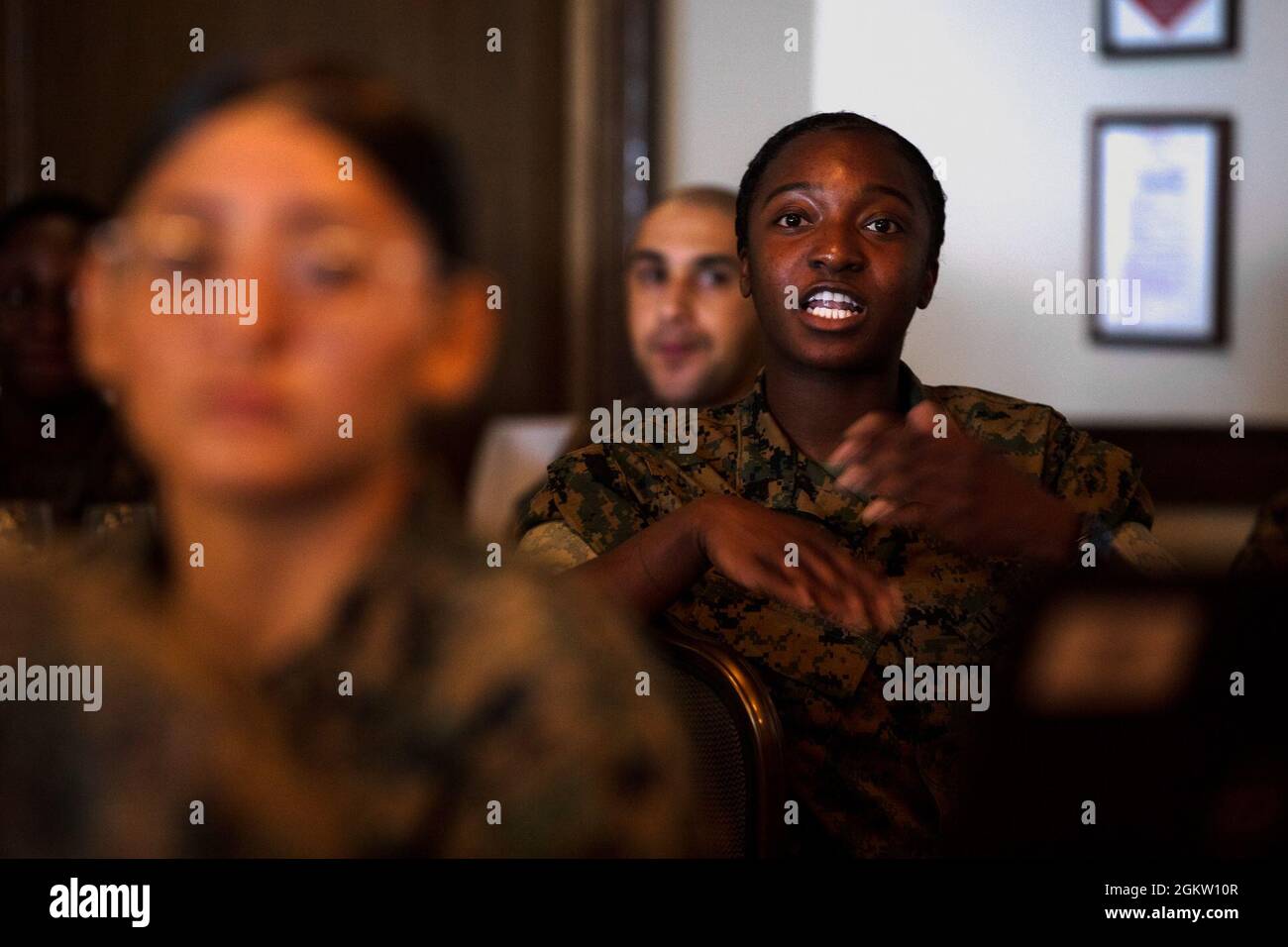 U.S. Marine Corps Cpl. Evelyn Baafuor, right, a data systems chief with ...