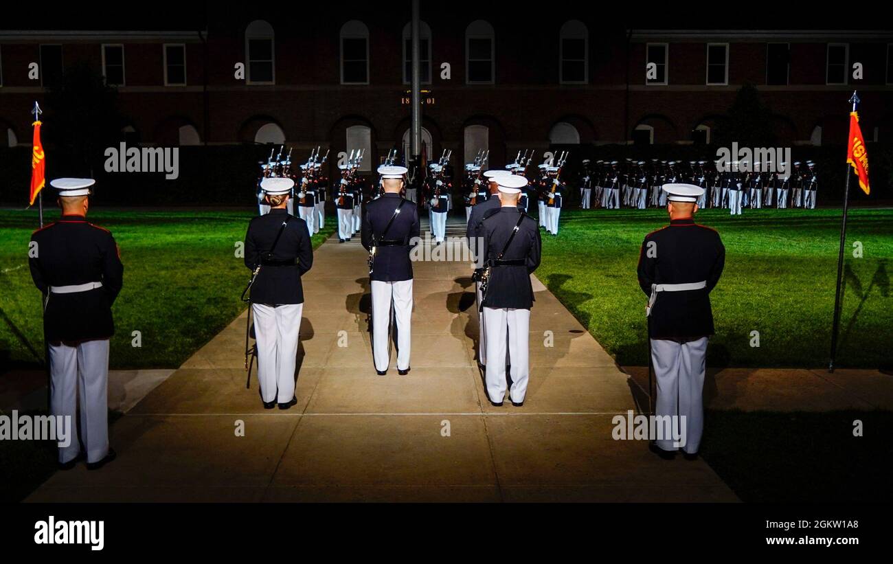 Marines with the Parade Staff stand at “ceremonial-at-ease” during the ...