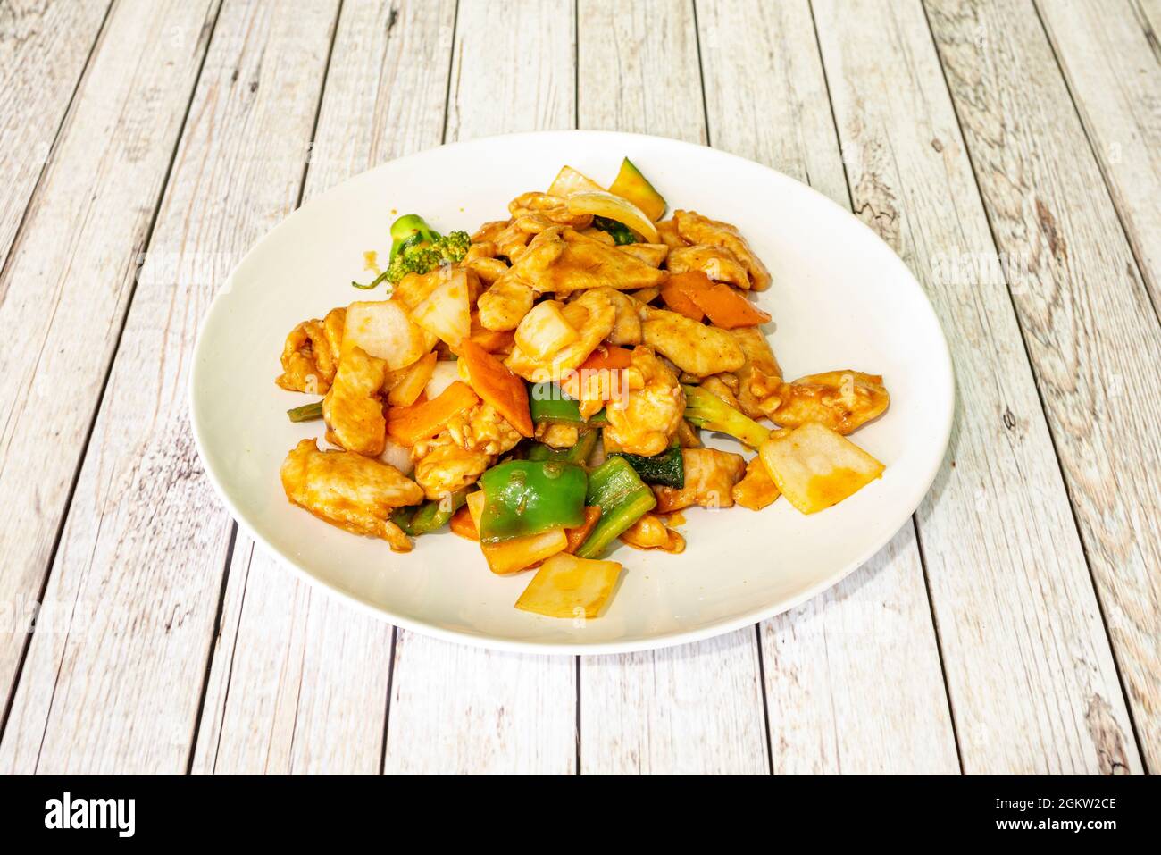 delicious tai-style chicken recipe cooked in a wok with assorted ...