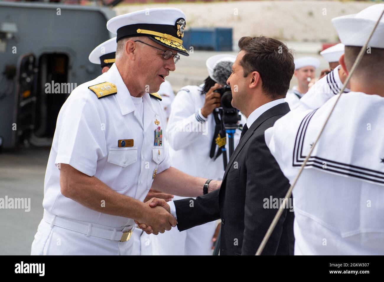 210704-N-MD802-1628 ODESA, Ukraine (July 4, 2021) Ukrainian president Volodymyr Zelensky shakes ...