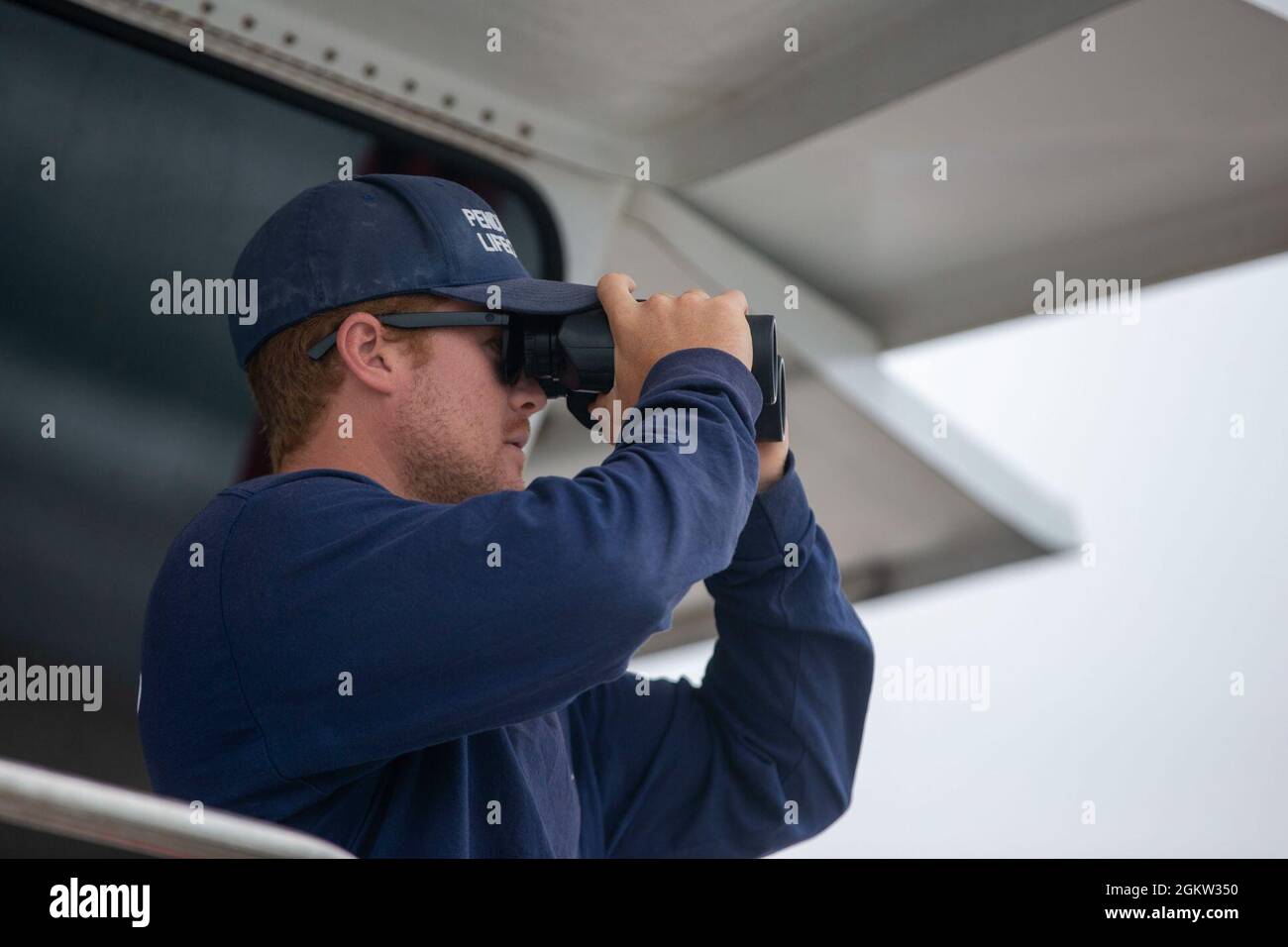 A lifeguard with Marine Corps Base Camp Pendleton observes beachgoers ...