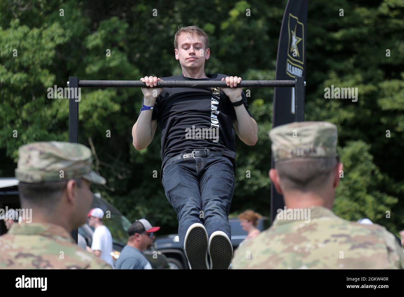 David Williams, from Oak Creek, Wisconsin, performs pull-ups during the ...