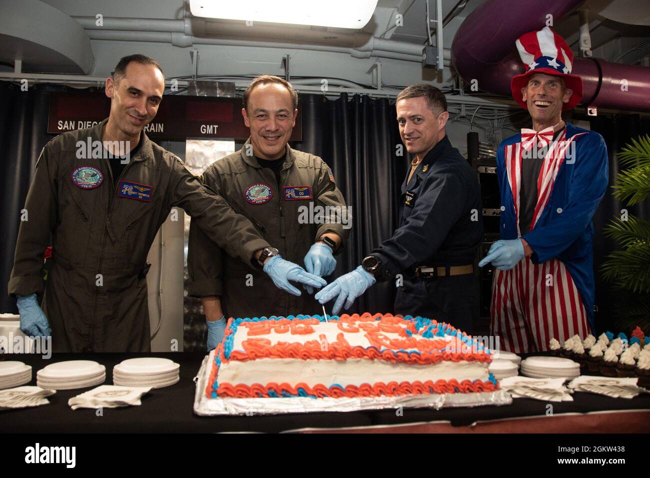 210704-N-UF592-1010 ARABIAN SEA (July 4, 2021) - From left, Capt ...