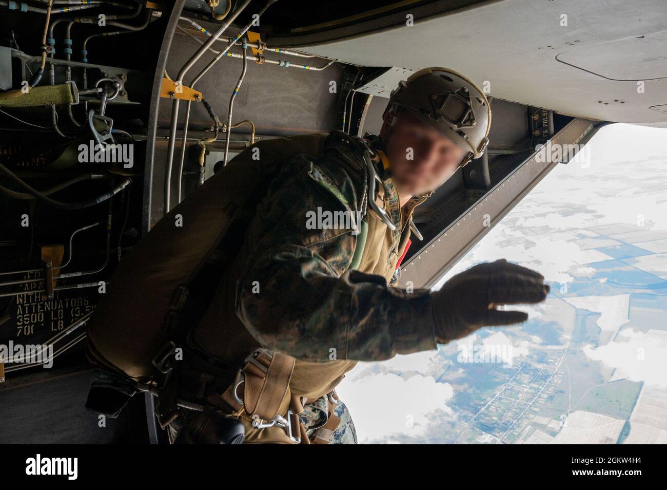 A U.S. Marine Jump Master assigned to the 1st Platoon, Force Company ...