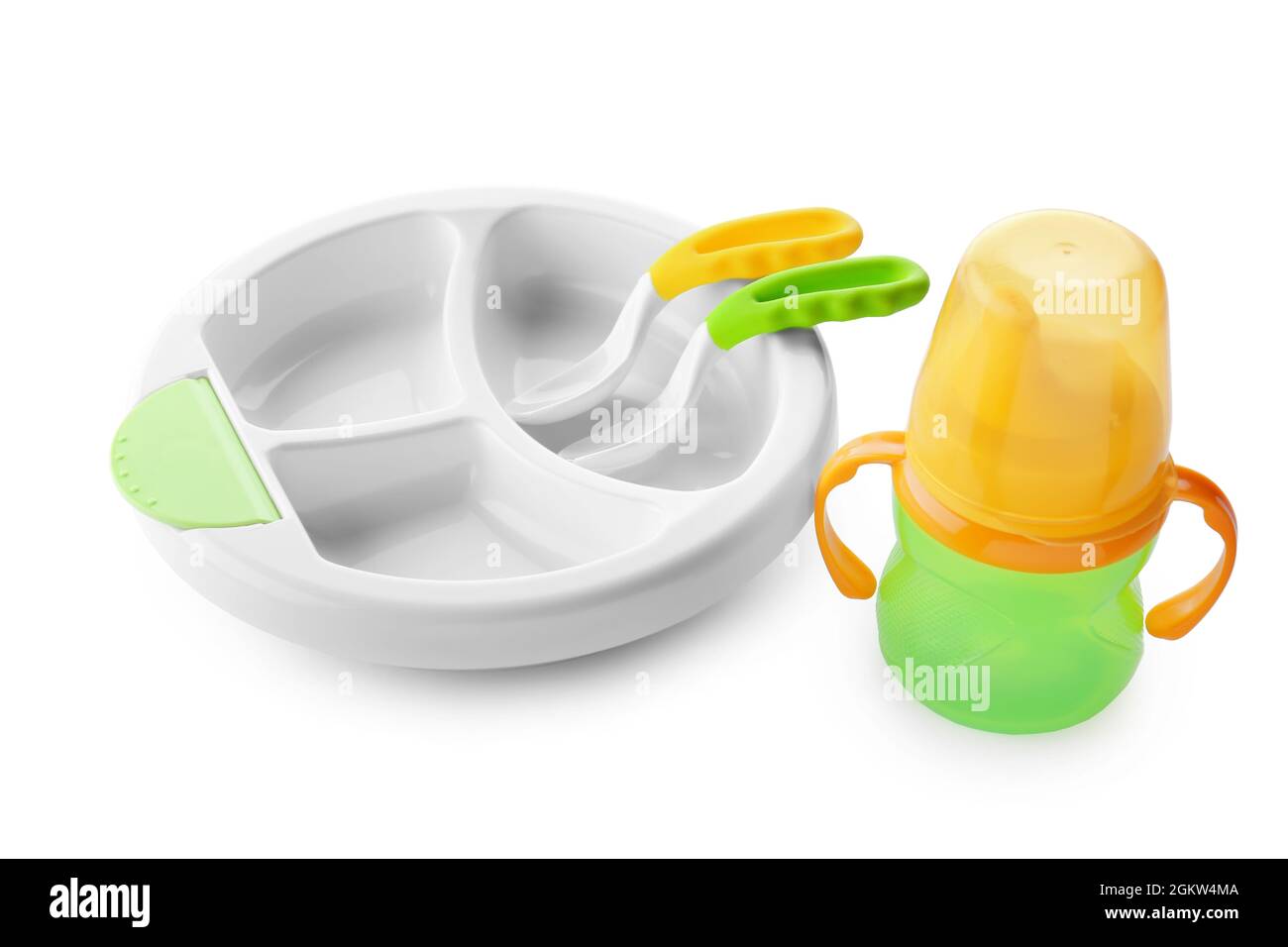 Bright baby tableware on white background Stock Photo - Alamy