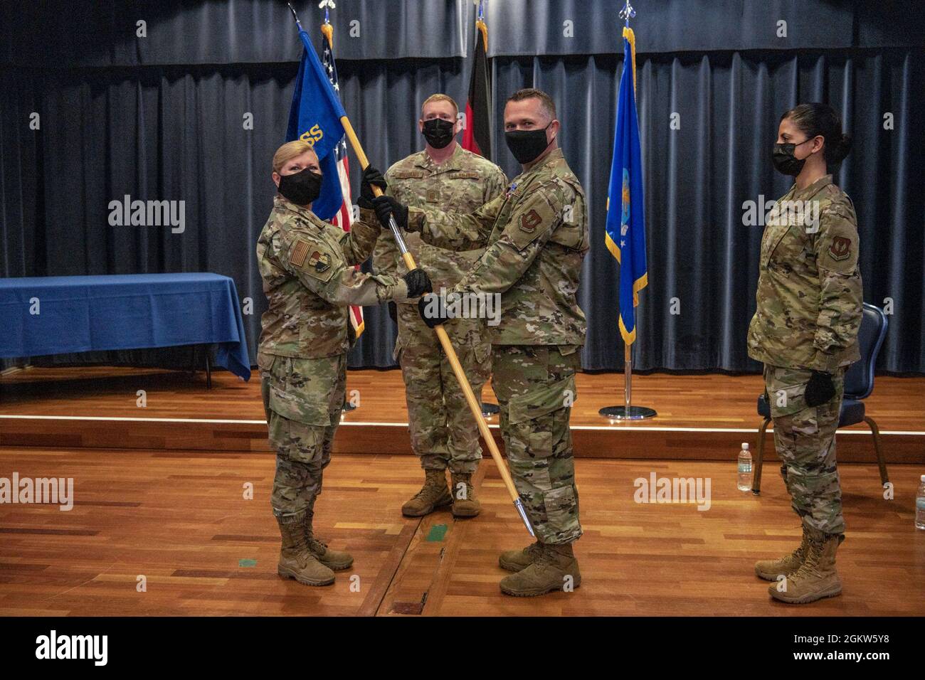 U.S. Air Force Lt. Col. Adam Baker (right), outgoing 52nd Force Support ...