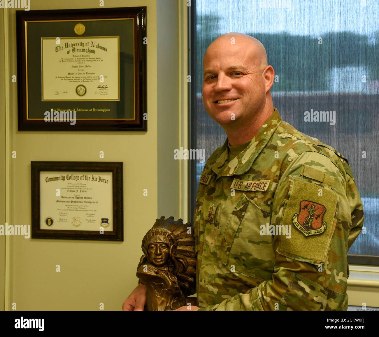 U.S. Air National Guard Command Chief Master Sgt. Nathan Fallin with a ...