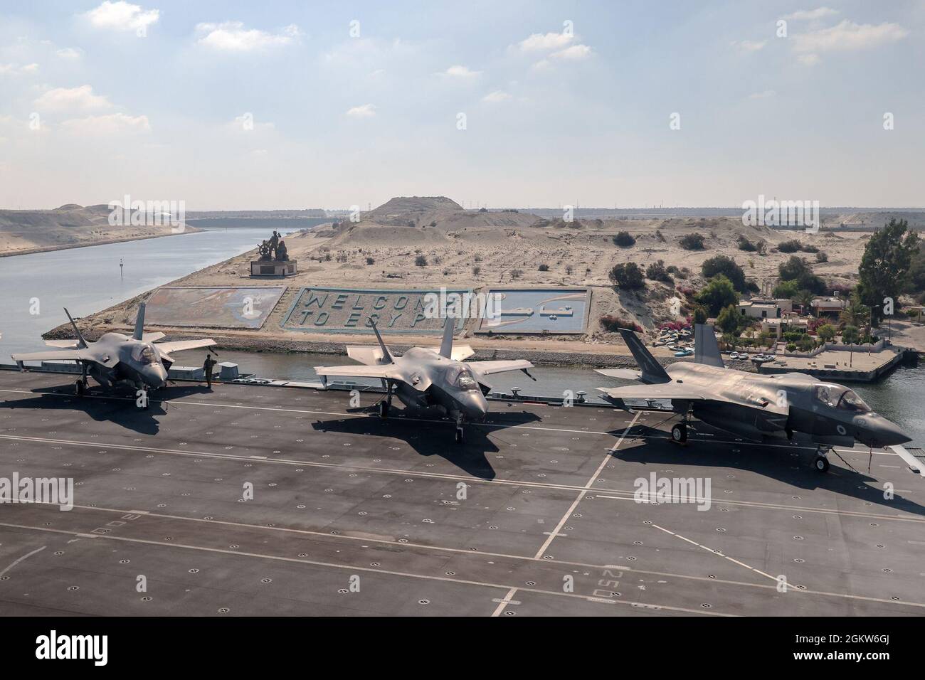 USS The Sullivans, Marine Fighter Attack Squadron 211 and HMS Queen ...