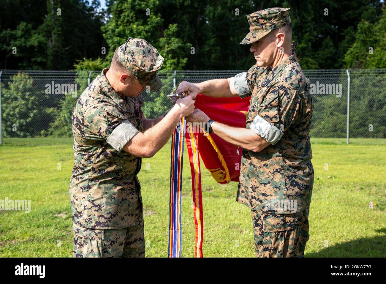 U.S. Marine Corps Lt. Col. Karl. W. Schlegel, left, commanding officer ...